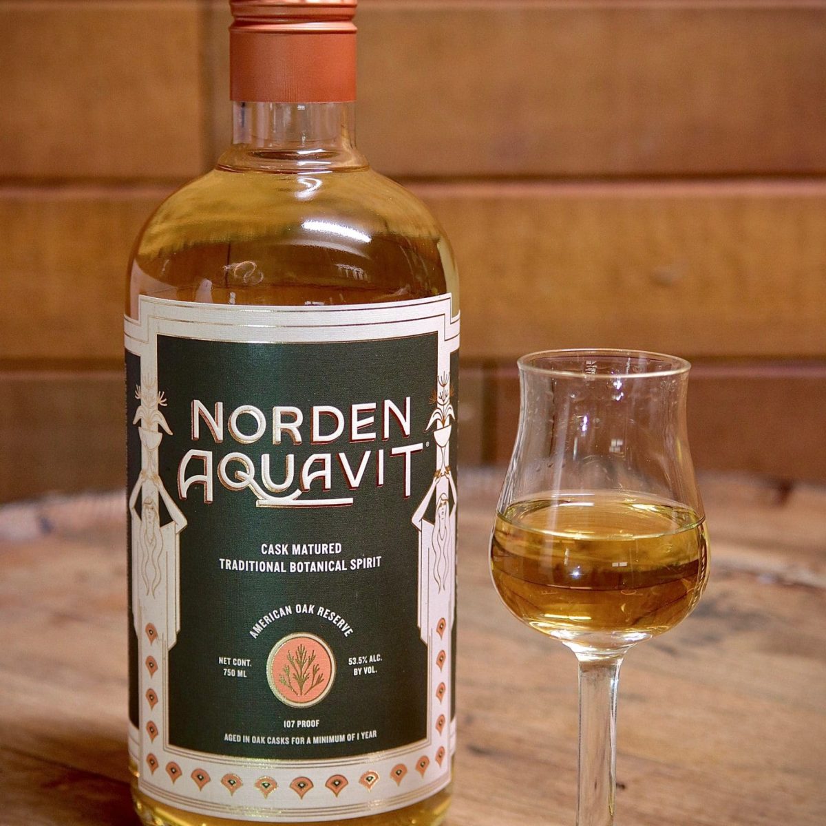 Gins distilled from a base spirit of corn